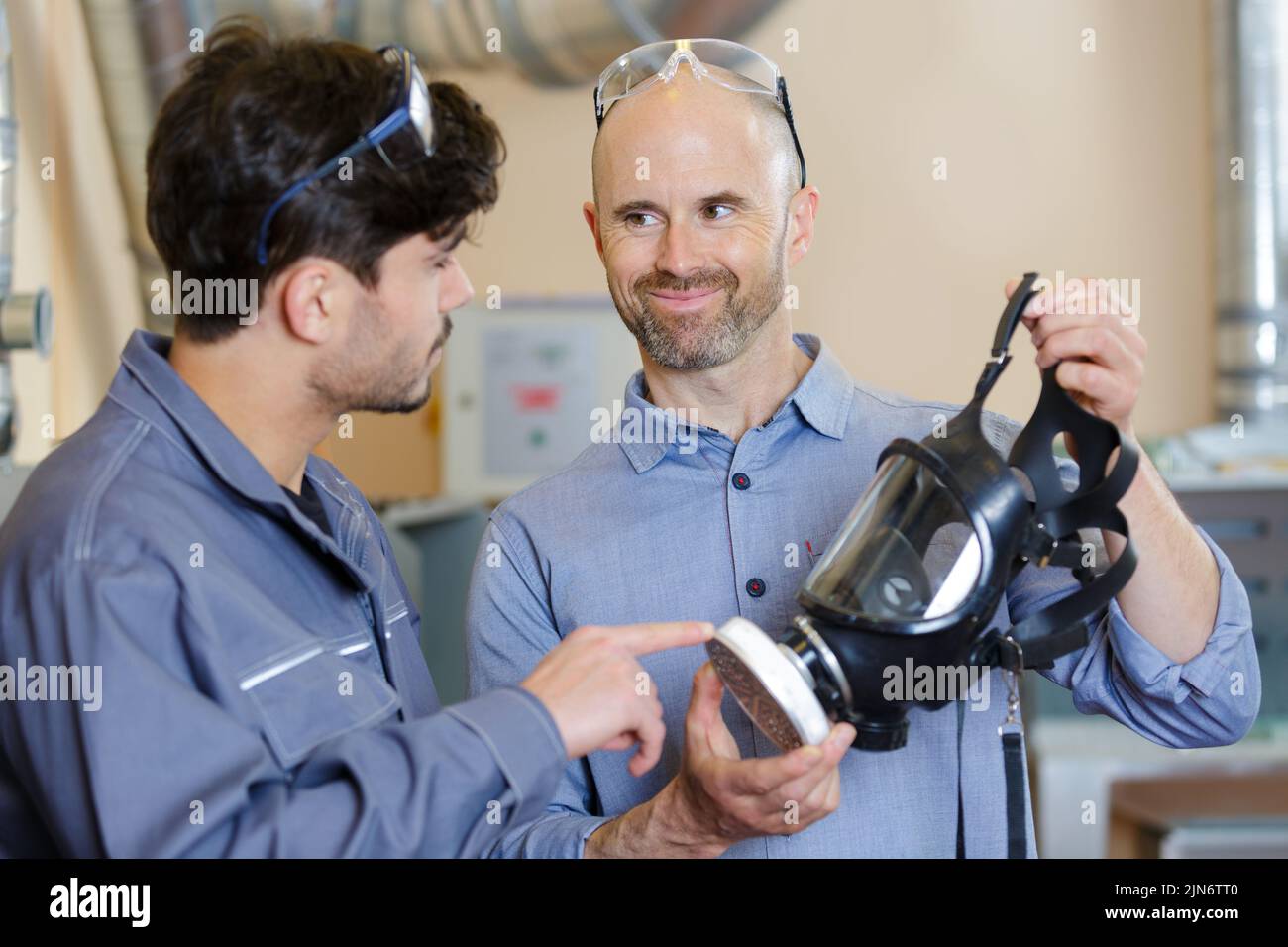man checking toxic gas mask Stock Photo - Alamy