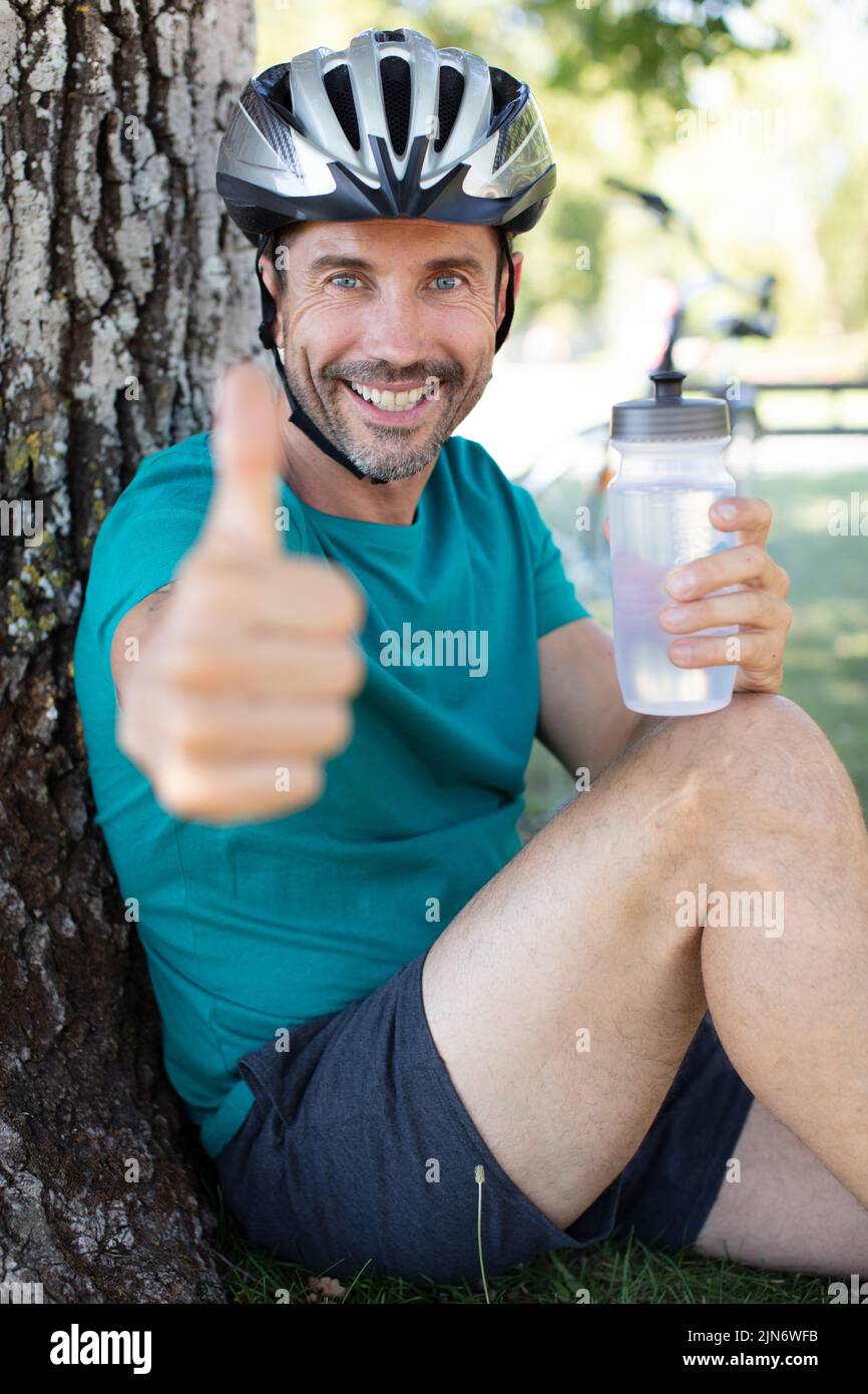 Positive man showing thumbs ups hi-res stock photography and images - Alamy