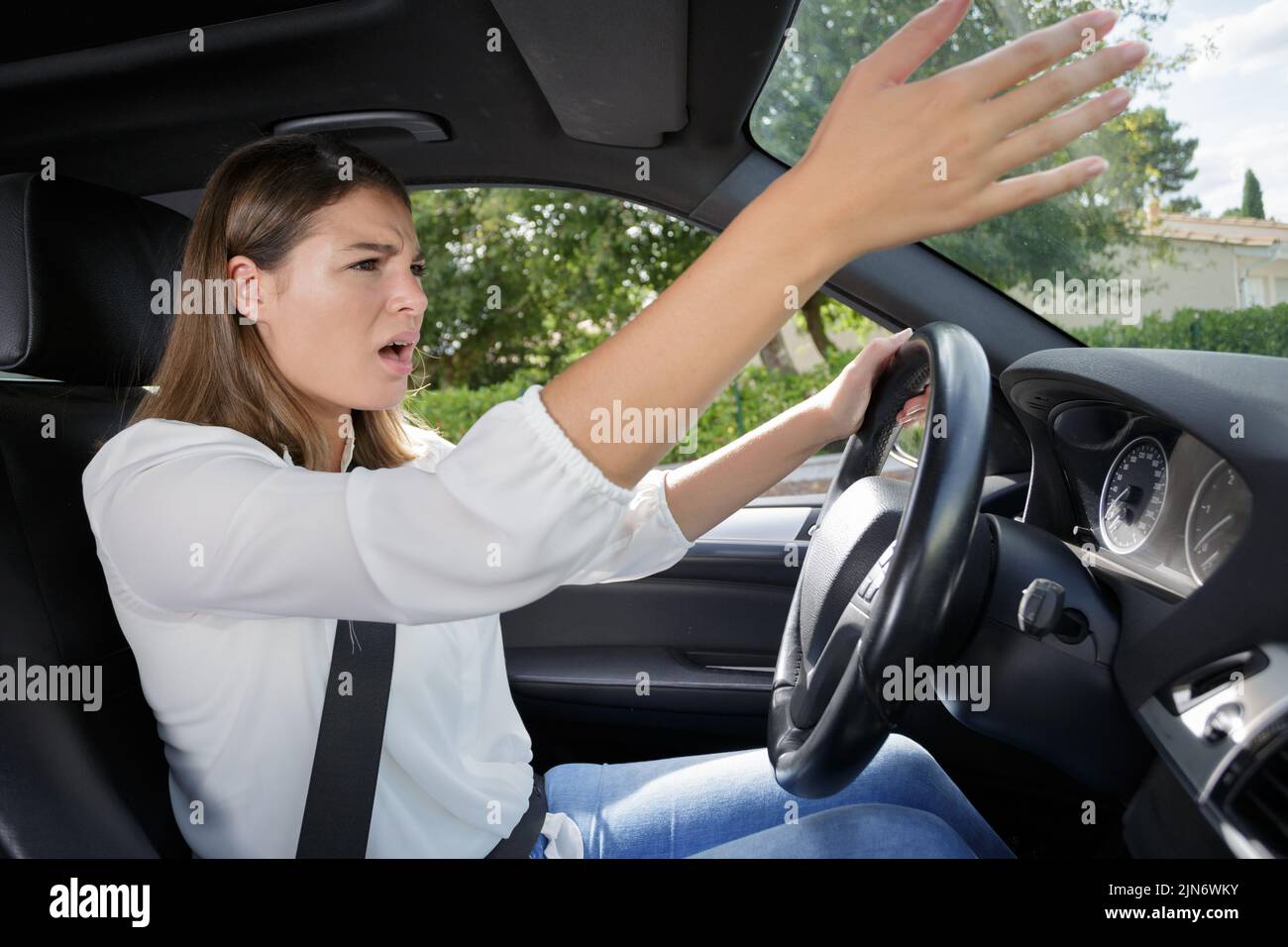 upset female driver in a car Stock Photo - Alamy