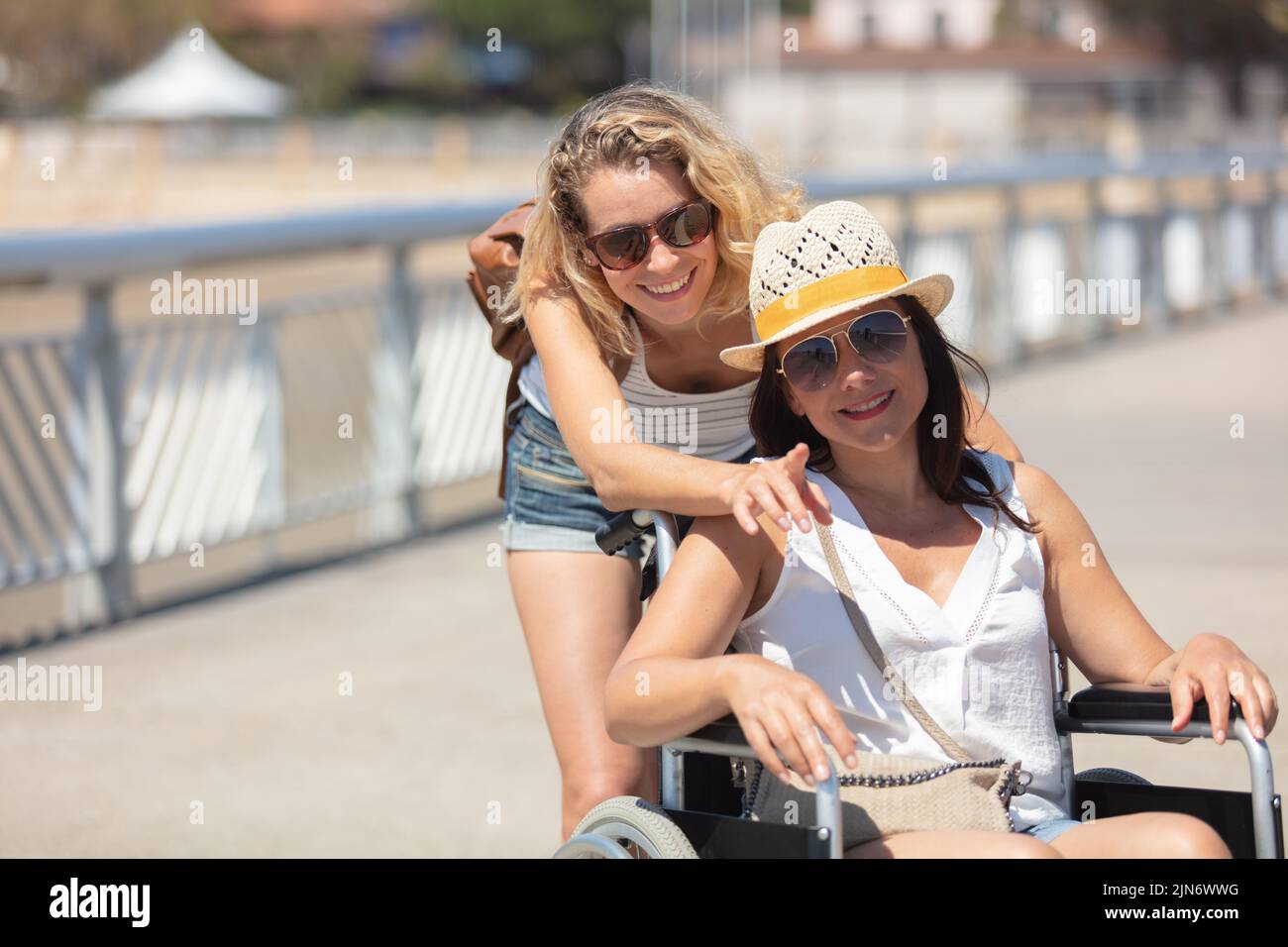 Wheelchair recovery friends hi-res stock photography and images - Alamy