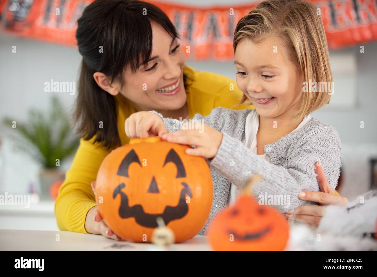 family mother and daughter getting ready for celebration Stock Photo ...