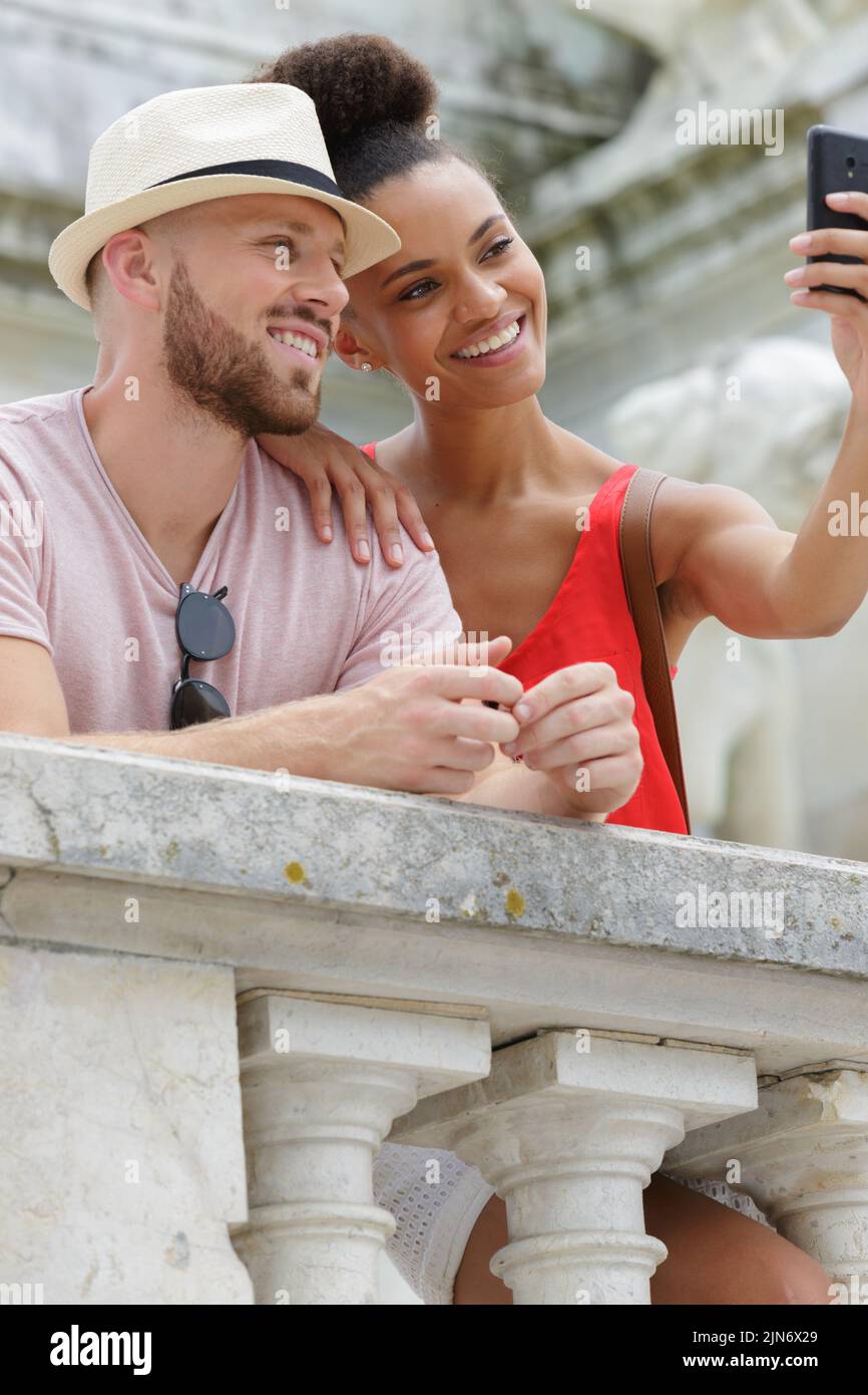 woman and man capturing bright moments Stock Photo - Alamy