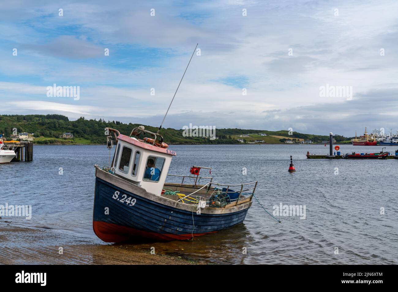 Killybegs, Ireland - 14 July, 2022: colorful fishing boat in the ... Killybegs, Ireland - 14 July, 2022: colorful fishing boat in the ...