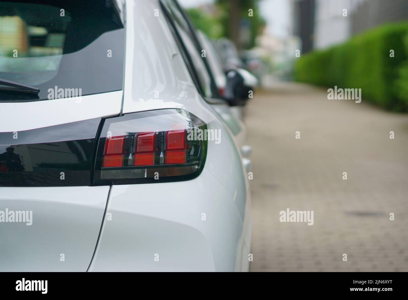 A rear light of modern white car Stock Photo - Alamy