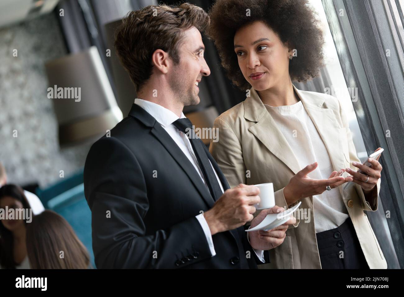 Young man women talking other hi-res stock photography and images - Alamy
