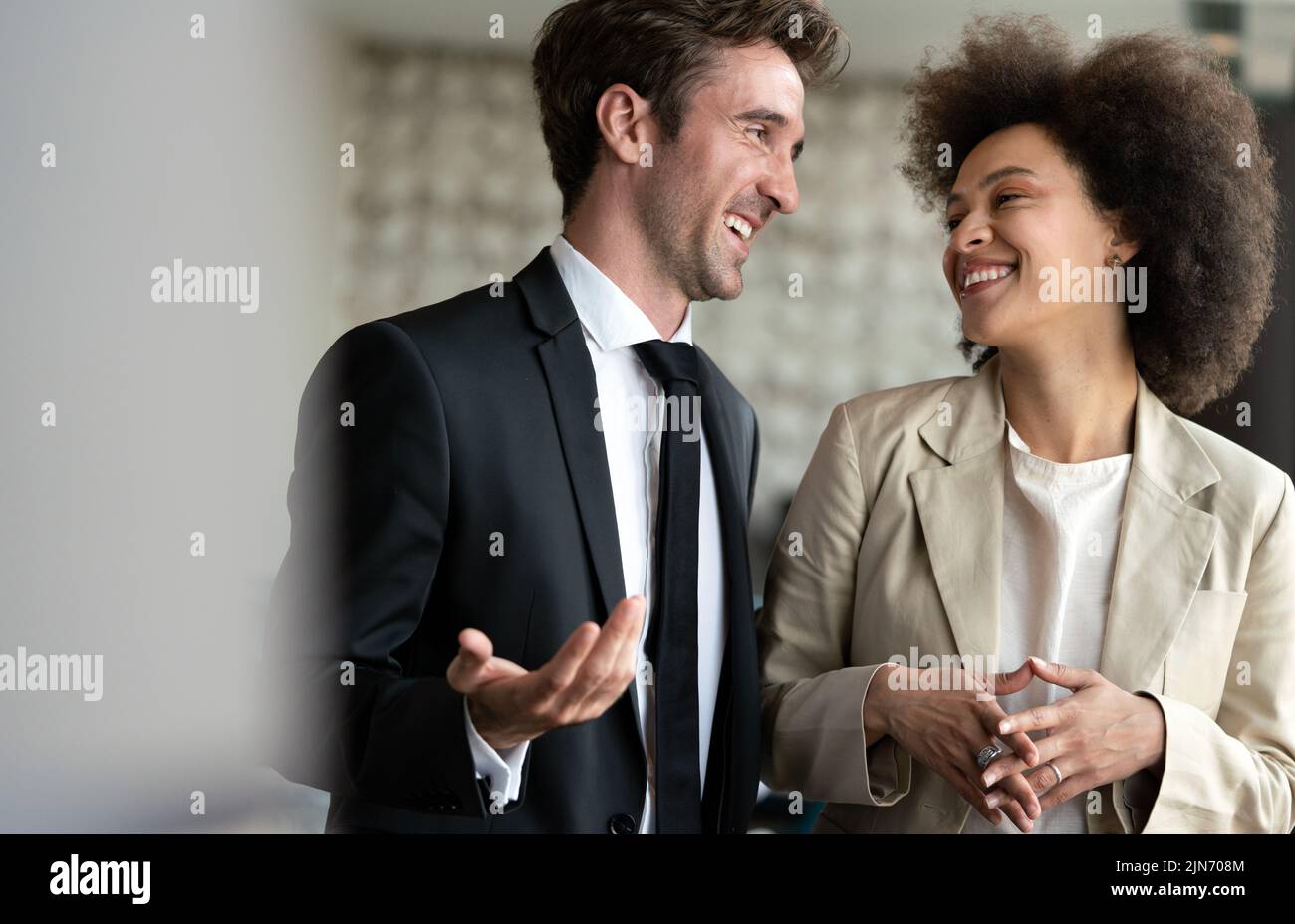Young couple of professionals chatting during a coffee break Stock ...