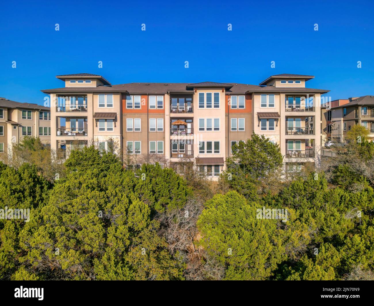 Austin, Texas- Apartment building with balconies and picture windows on ...