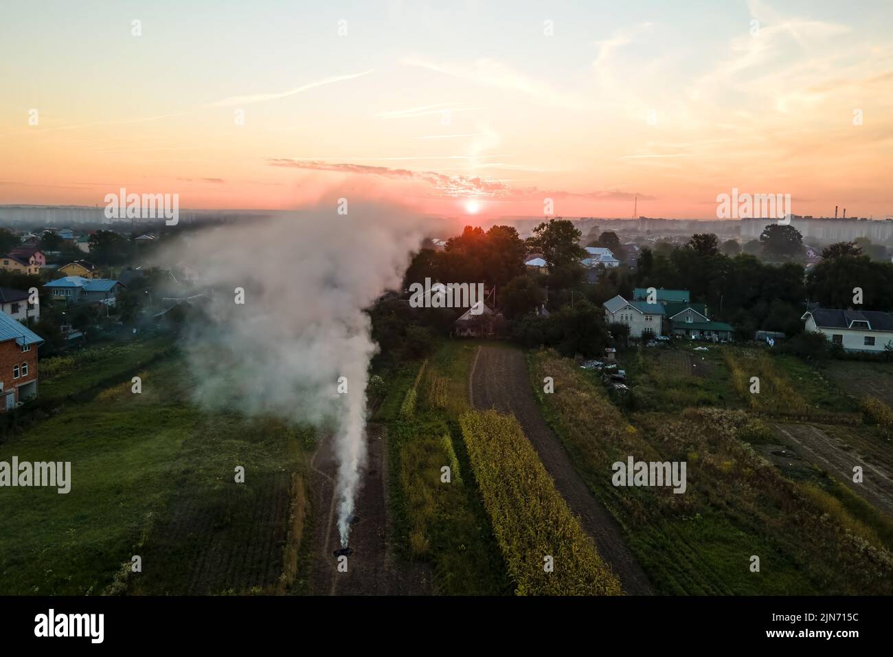 Aerial view of agricultural waste bonfires from dry grass and straw ...