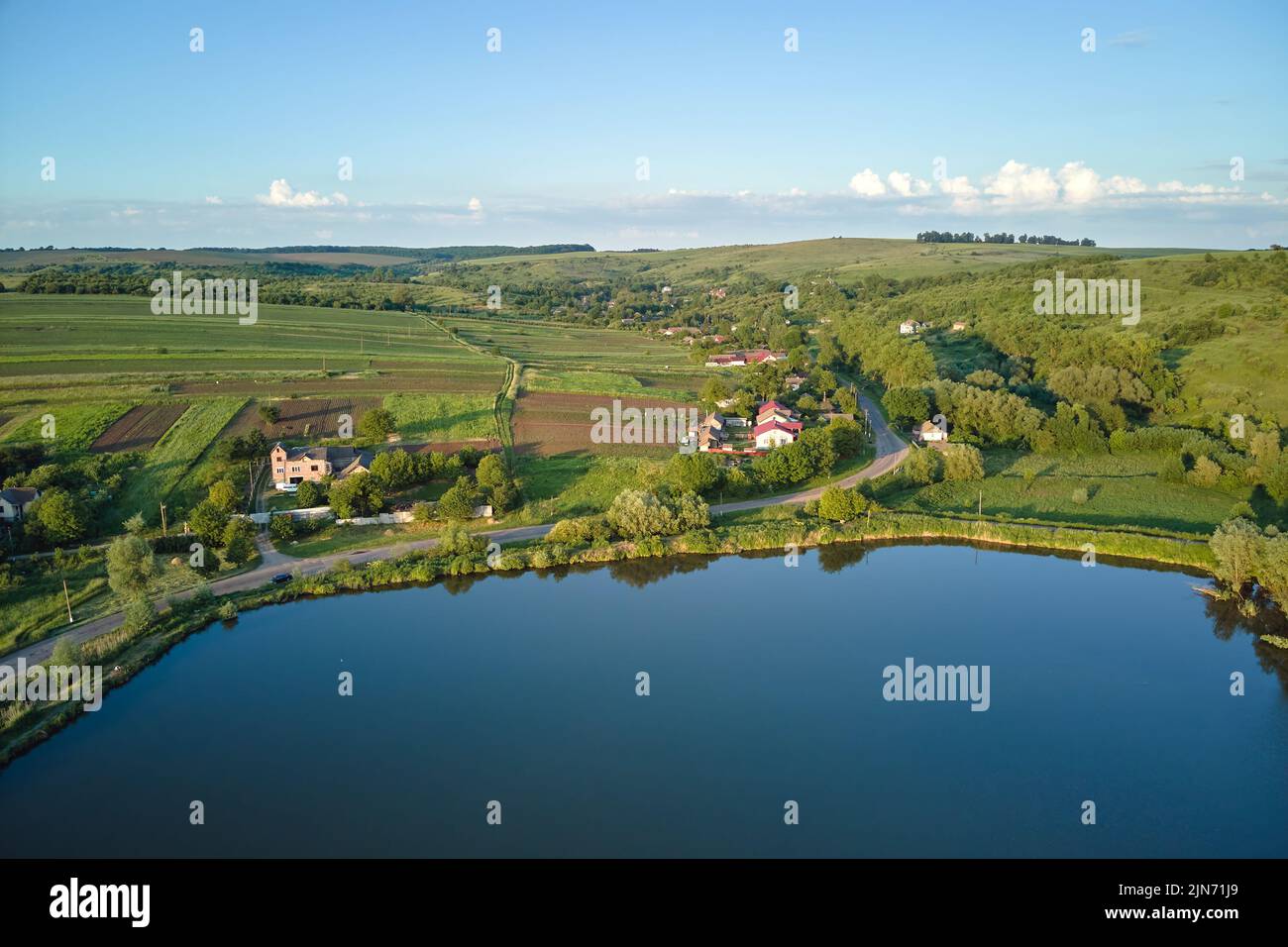 Aerial view of fish hetching pond with blue water in aquacultural area ...