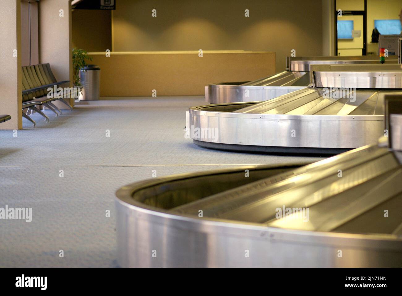 An empty luggage area in an airport Stock Photo - Alamy