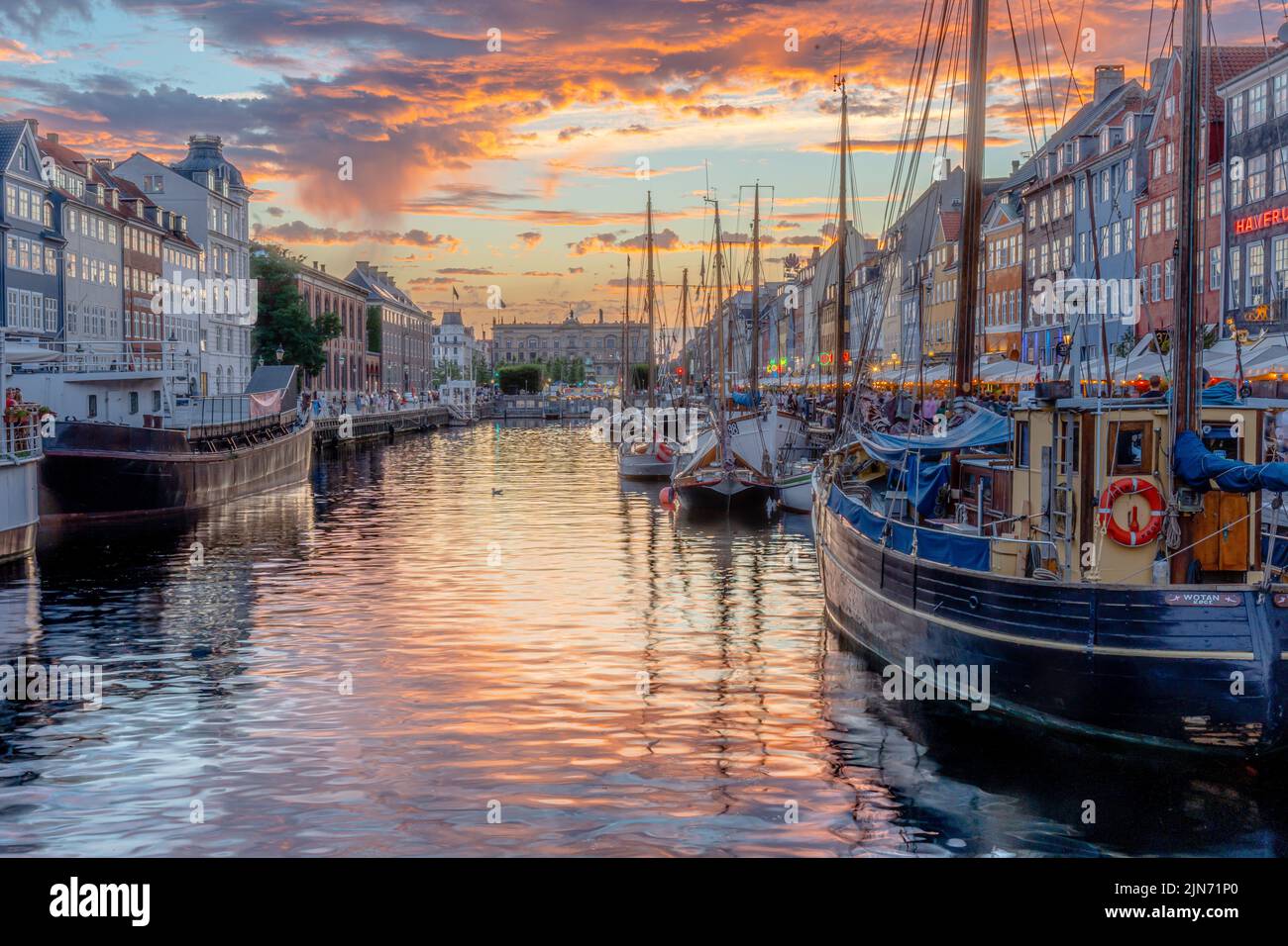 A beautiful shot of a famous tourist spot Nyhavn in Copenhagen with a ...
