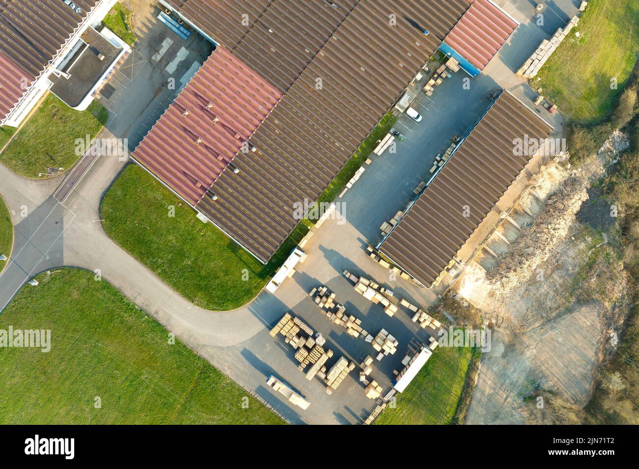 Aerial view of modern factory structure for production and distribution ...