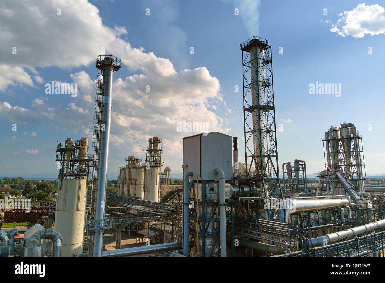 Aerial view of oil and gas refining petrochemical factory with tall ...