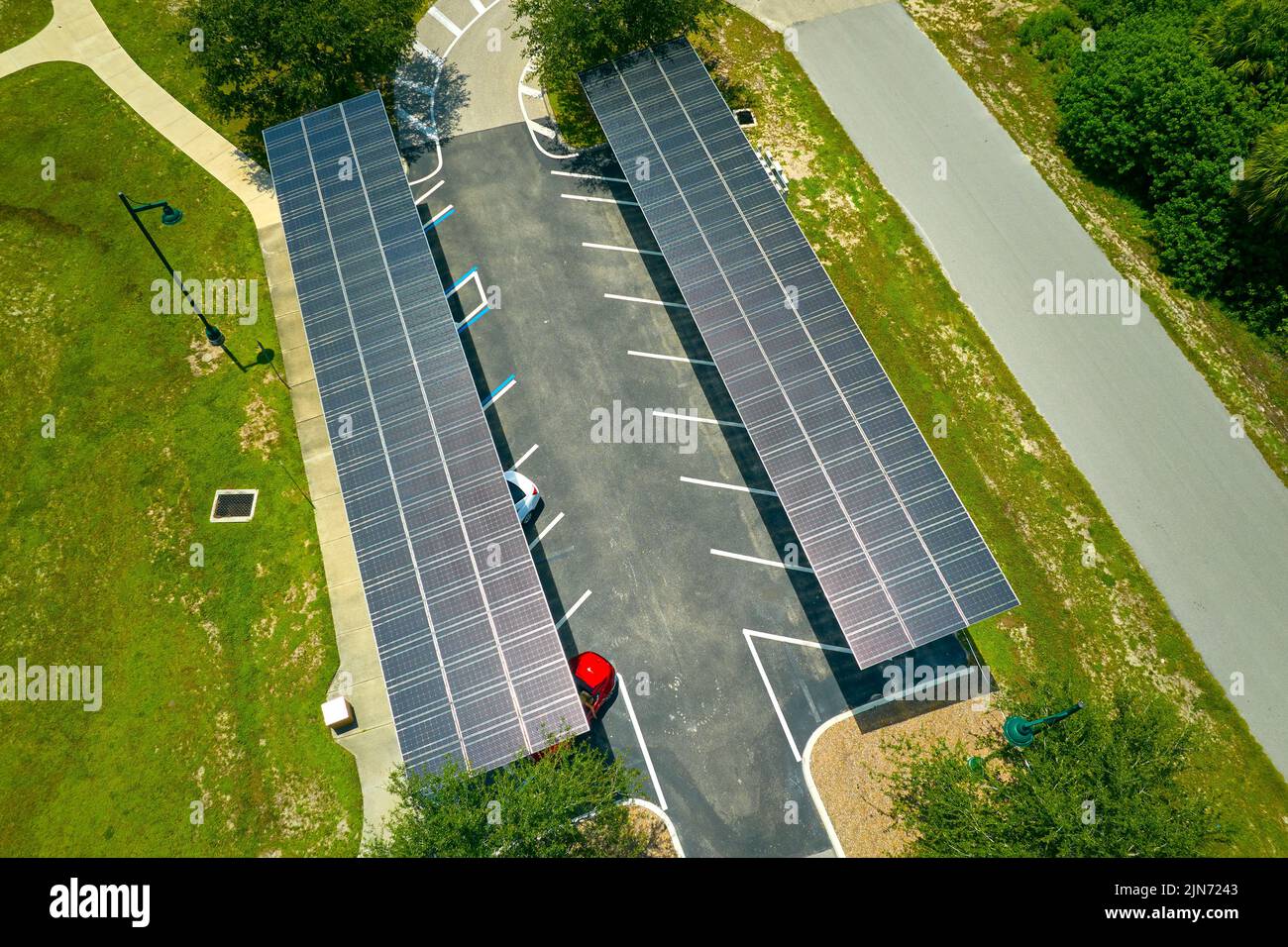 Aerial view of solar panels installed as shade roof over parking lot ...