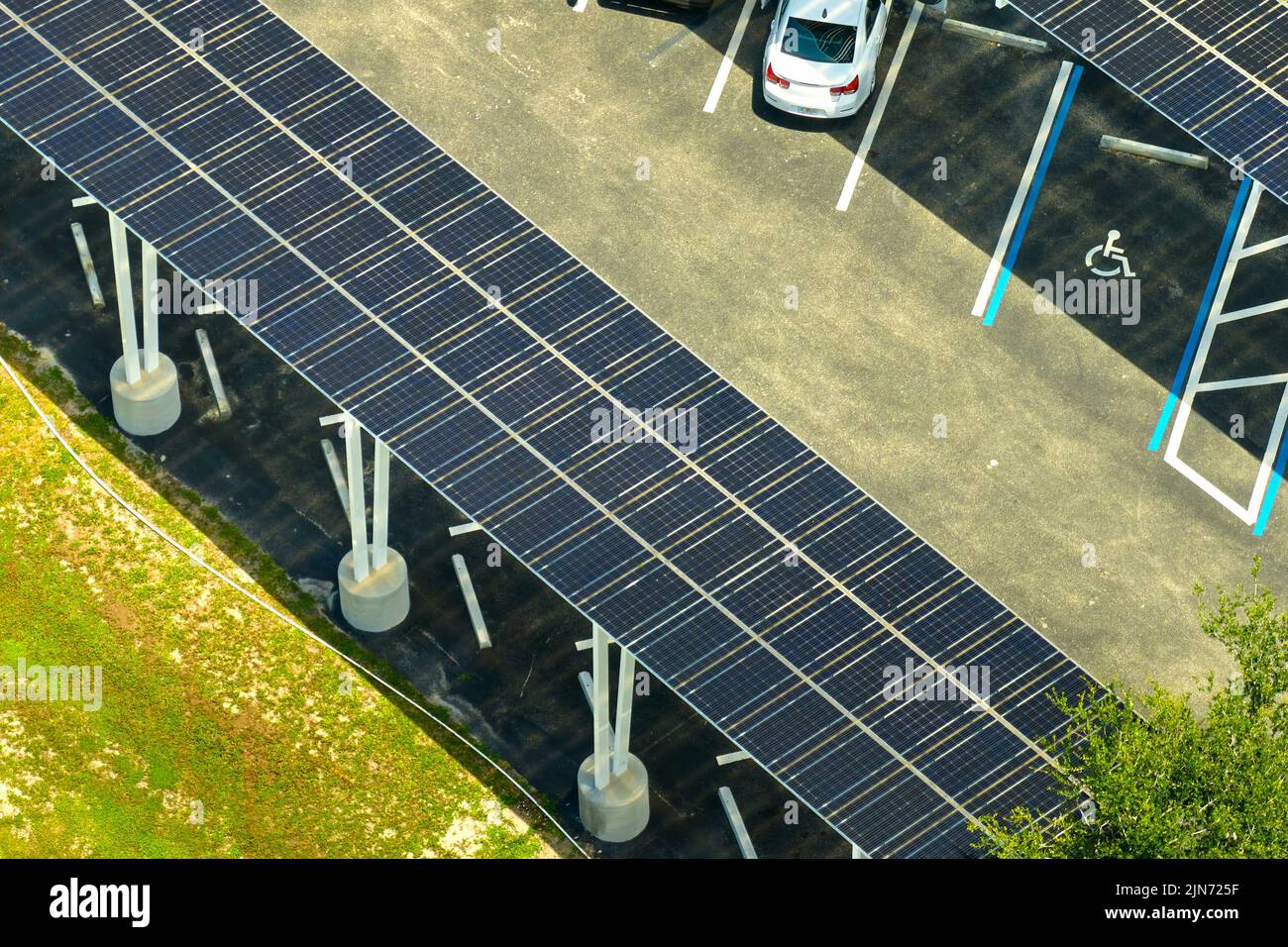 Aerial view of solar panels installed as shade roof over parking lot ...