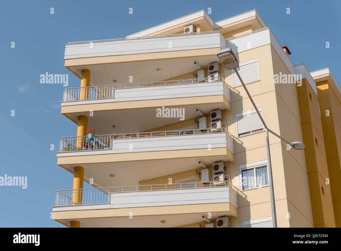 New residential apartment building with large balconies. Houses of ...