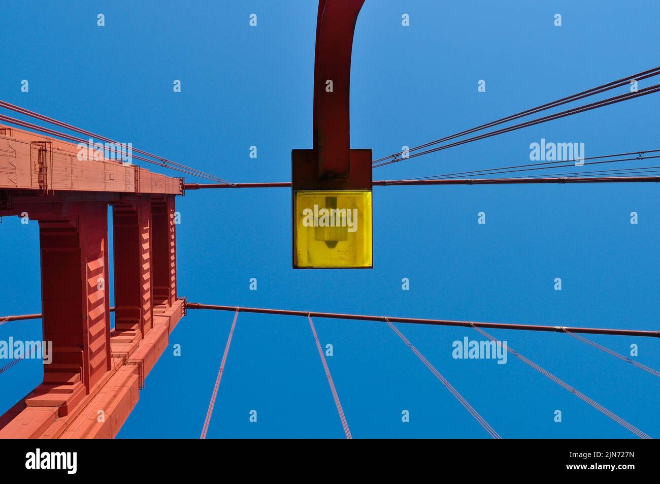 Golden Gate Bridge tower and road lighting with blue sky Stock Photo ...
