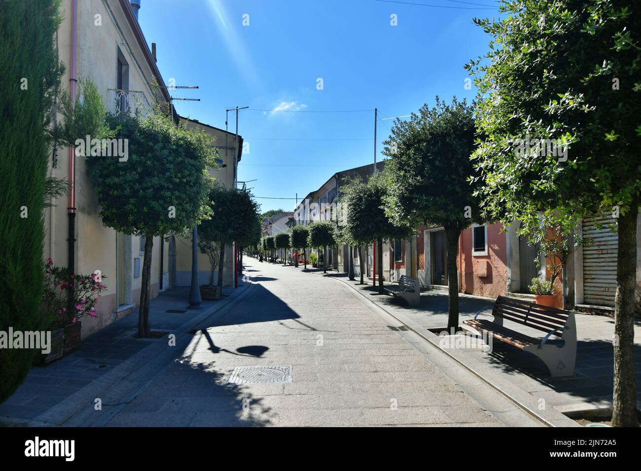 A small street between the old houses of Savignano Irpino, one of the ...