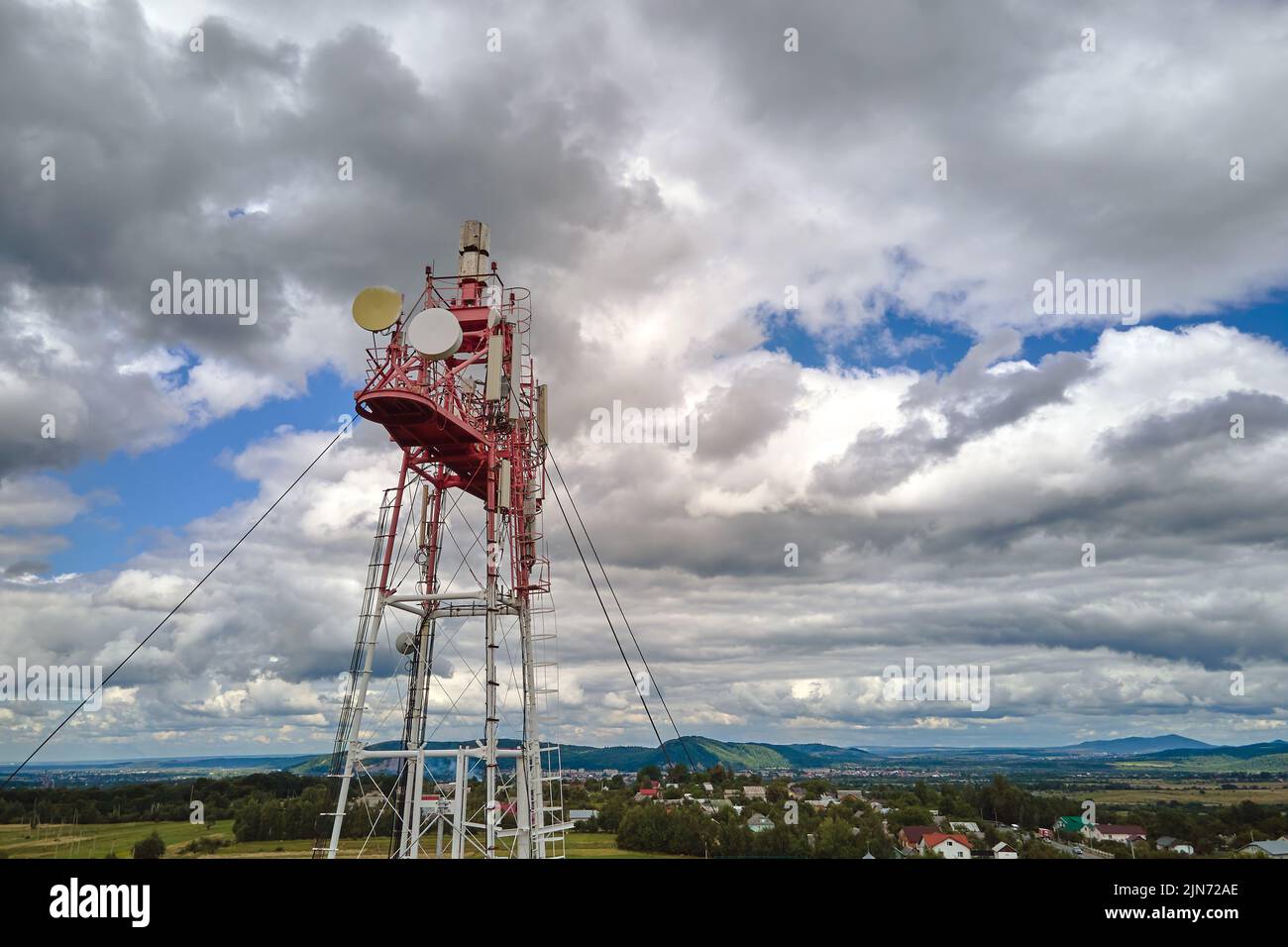 Aerial view of telecommunications cell phone tower with wireless ...