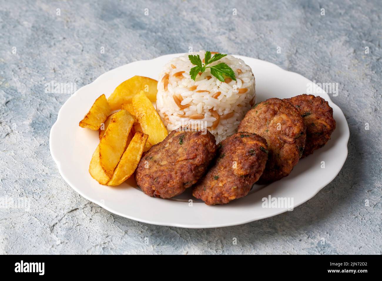 Traditional Turkish food; dry meatballs or inegöl meatballs with ...