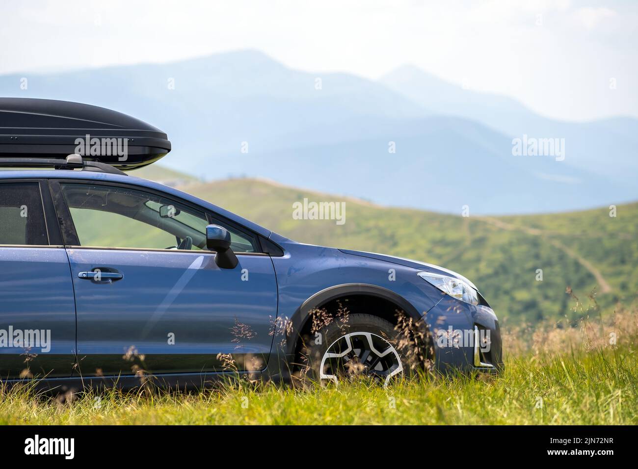 Blue off road car on mountain trail. Traveling by auto, adventure in ...