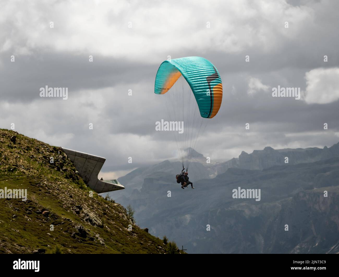 A paradglider in the Alps Stock Photo - Alamy