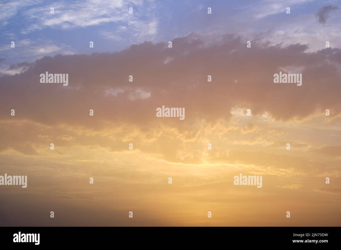 Dramatic bright red sky with orange-gray th.underclouds at sunset over ...