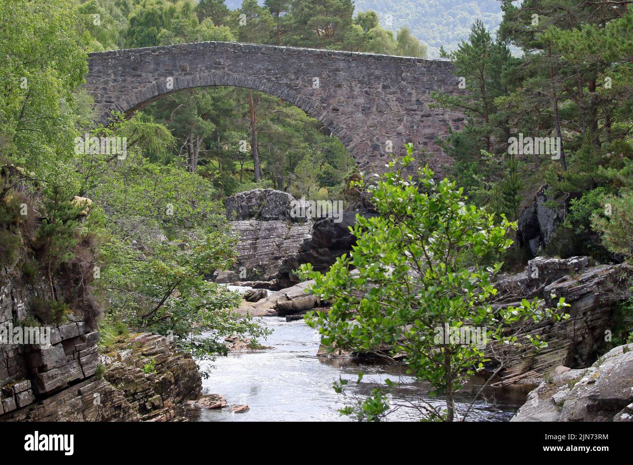 The Silver Bridge over the river Black Water in the Scottish Highlands ...