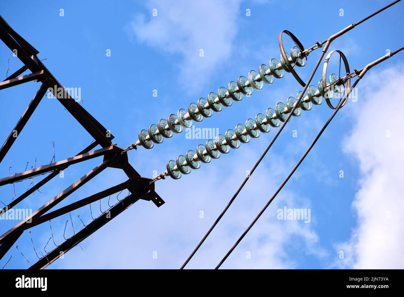 High voltage power line with insulation divider of electric power wires ...