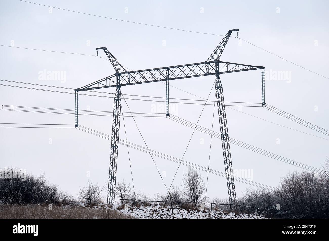 High voltage tower with electric power lines transfening electrical ...