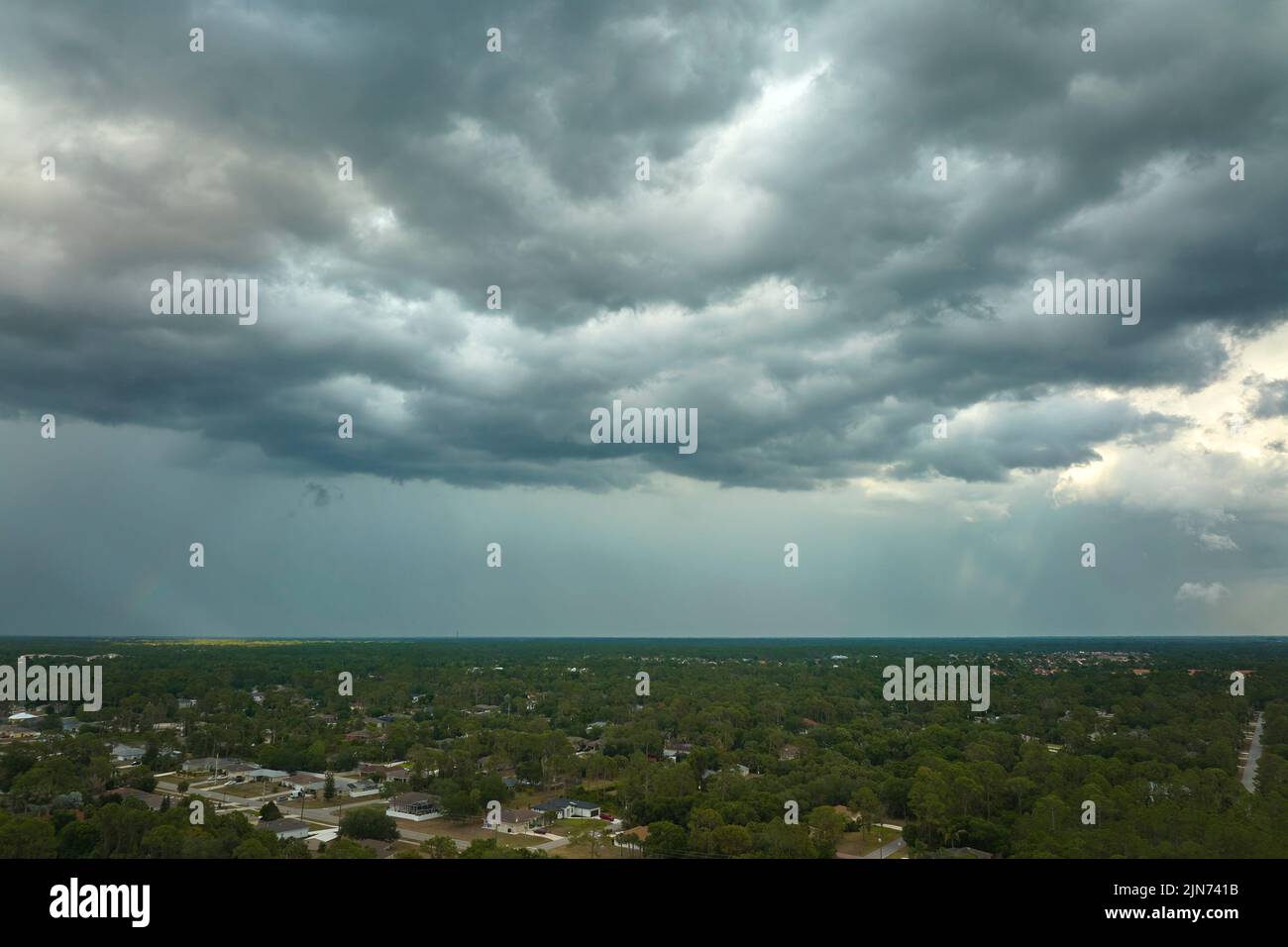Landscape of dark ominous clouds forming on stormy sky before heavy ...