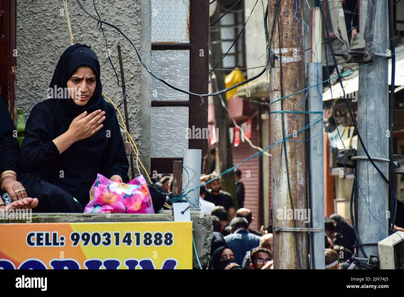 A Kashmiri Shiite Muslim takes part in a mourning ritual to mark Ashura ...
