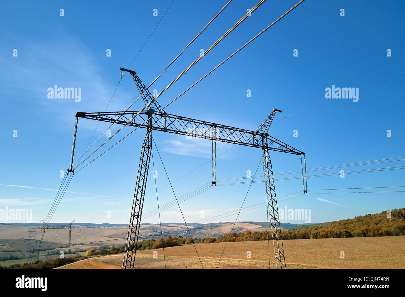 Steel pillar with high voltage electric power lines delivering ...