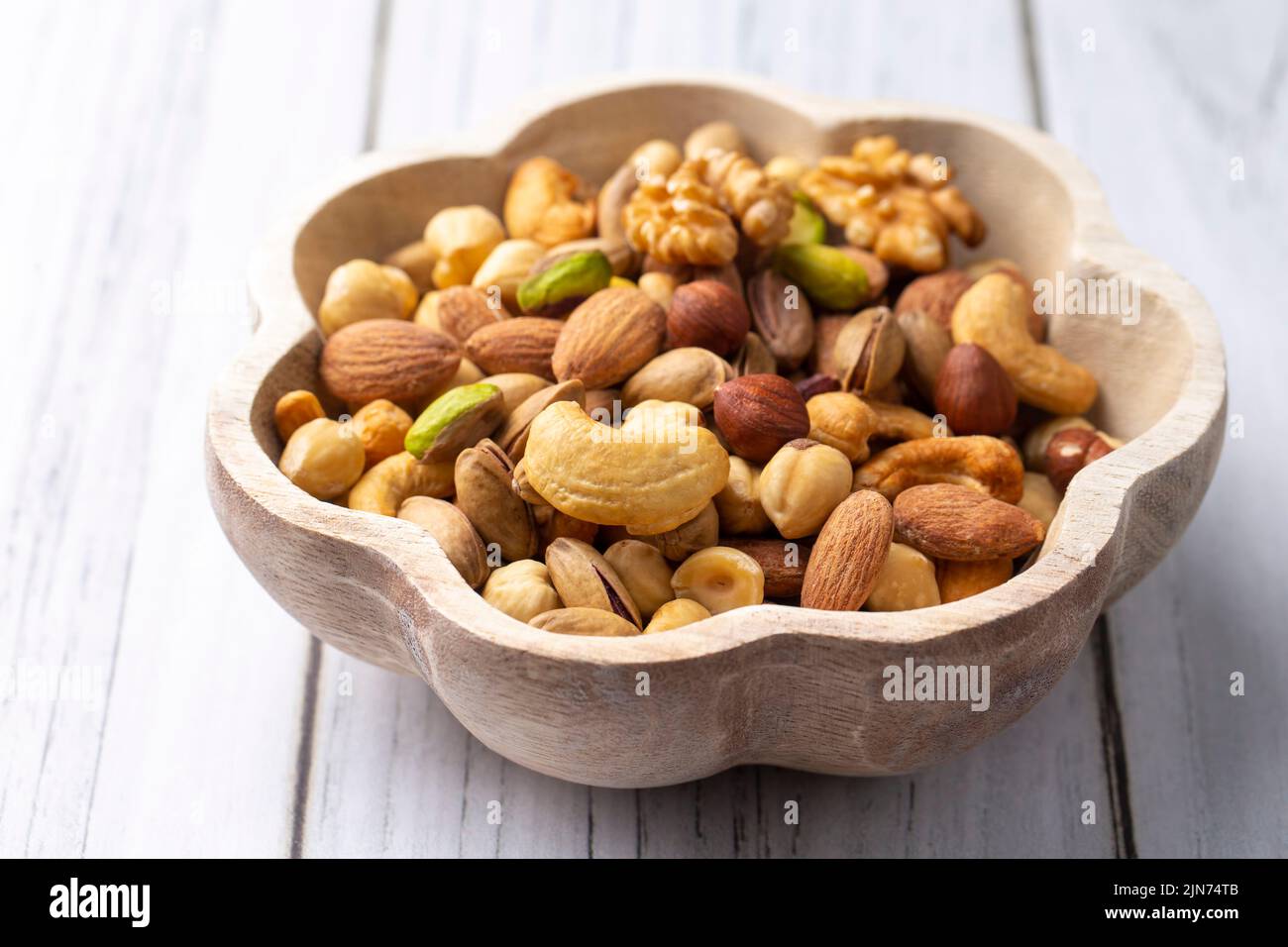Mixed nuts on a white background Stock Photo - Alamy