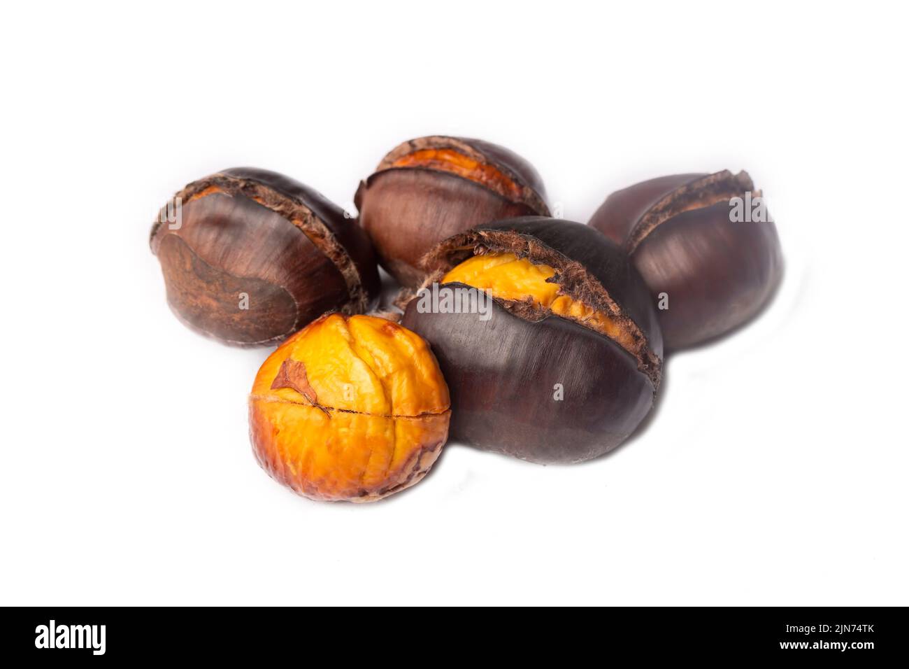 A group of roasted chestnuts on the white background Stock Photo - Alamy