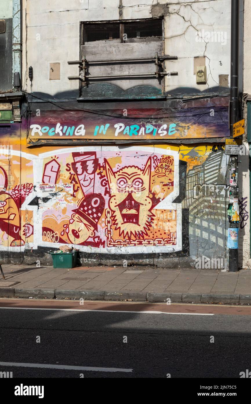 Contemporary Street Art - urban graffiti on a wall in Stokes Croft ...