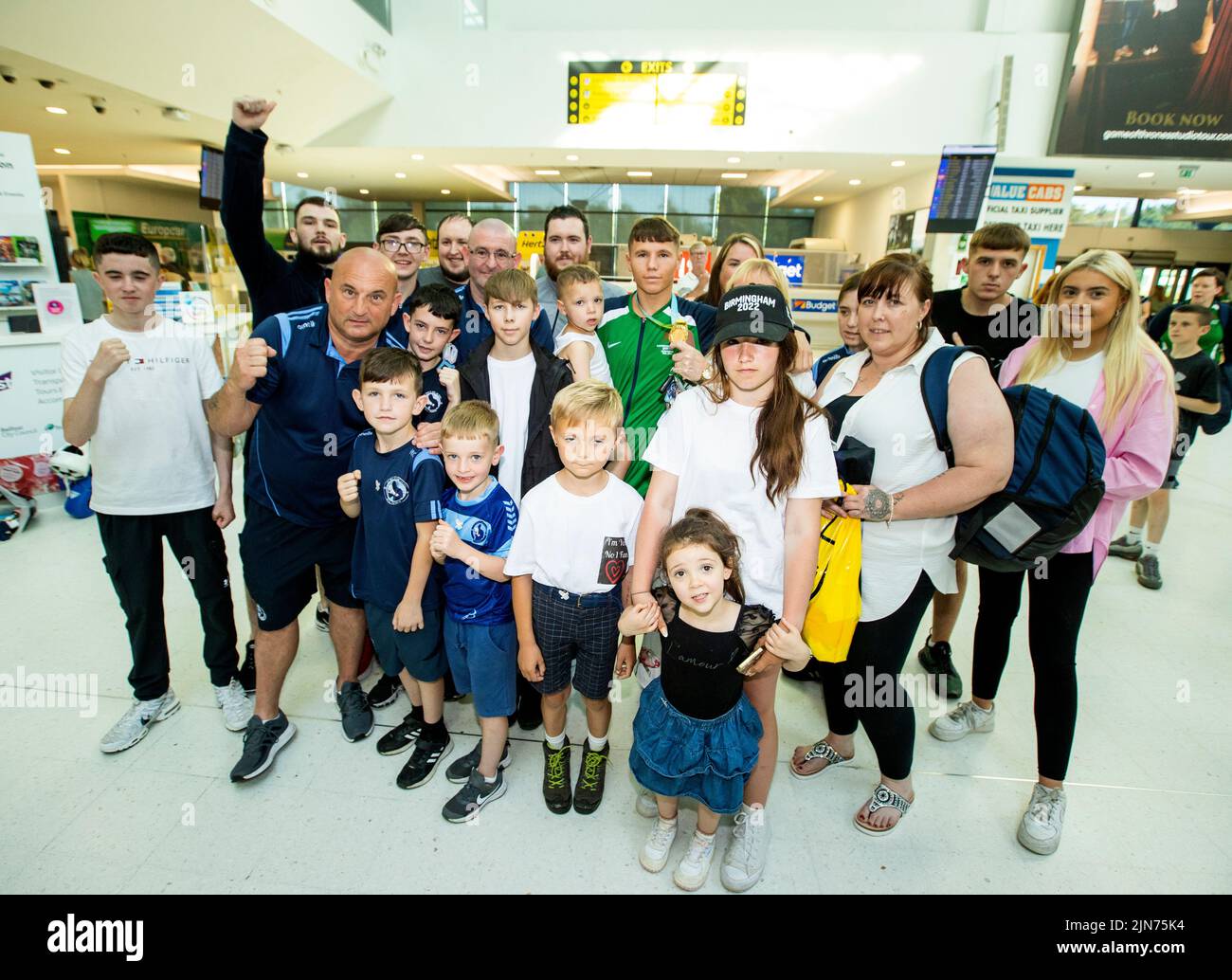 Jude Gallagher (centre) with his winning Gold medal in Boxing from ...