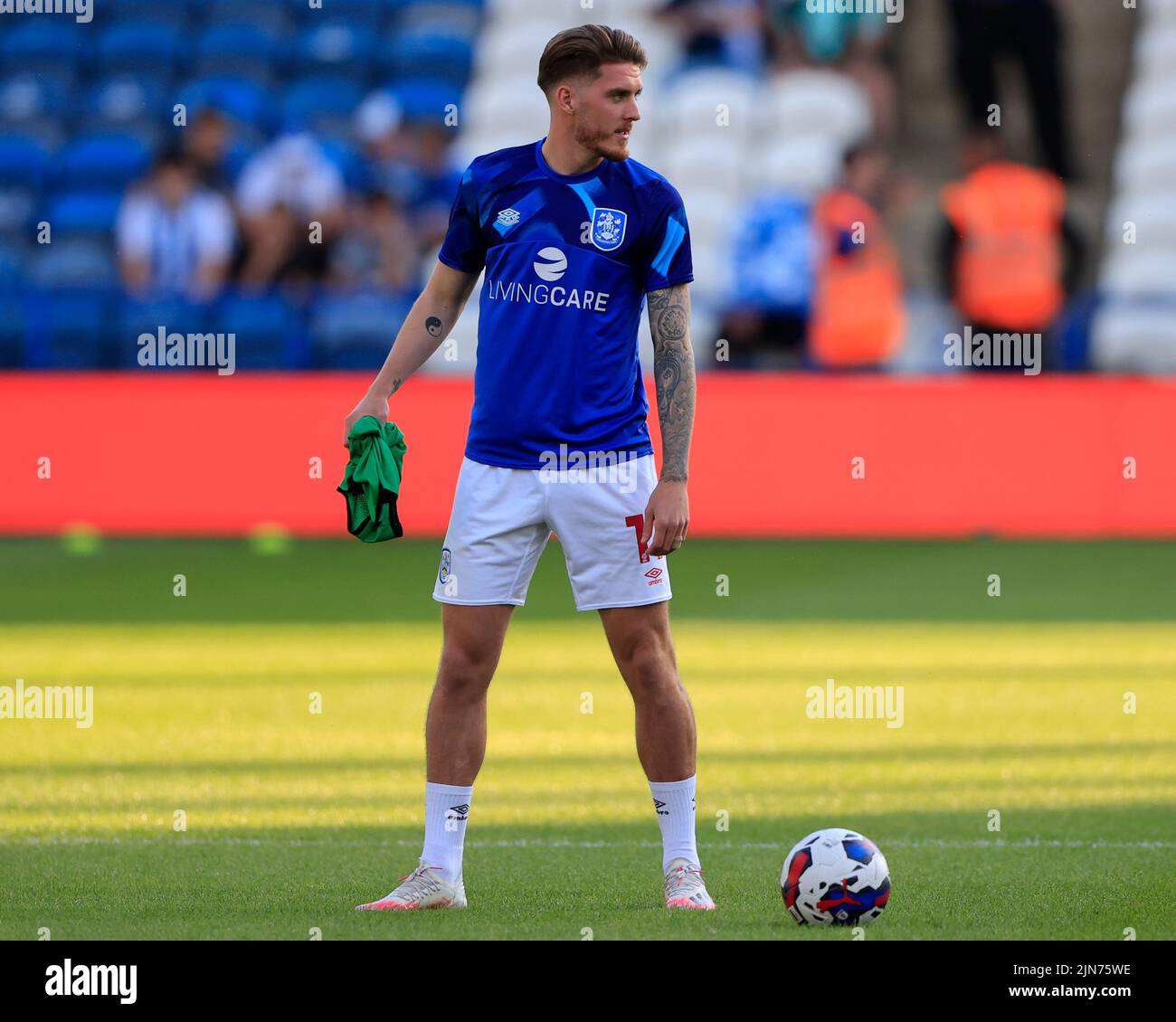 Connor Mahoney #11 of Huddersfield Town warms up for the game Stock ...