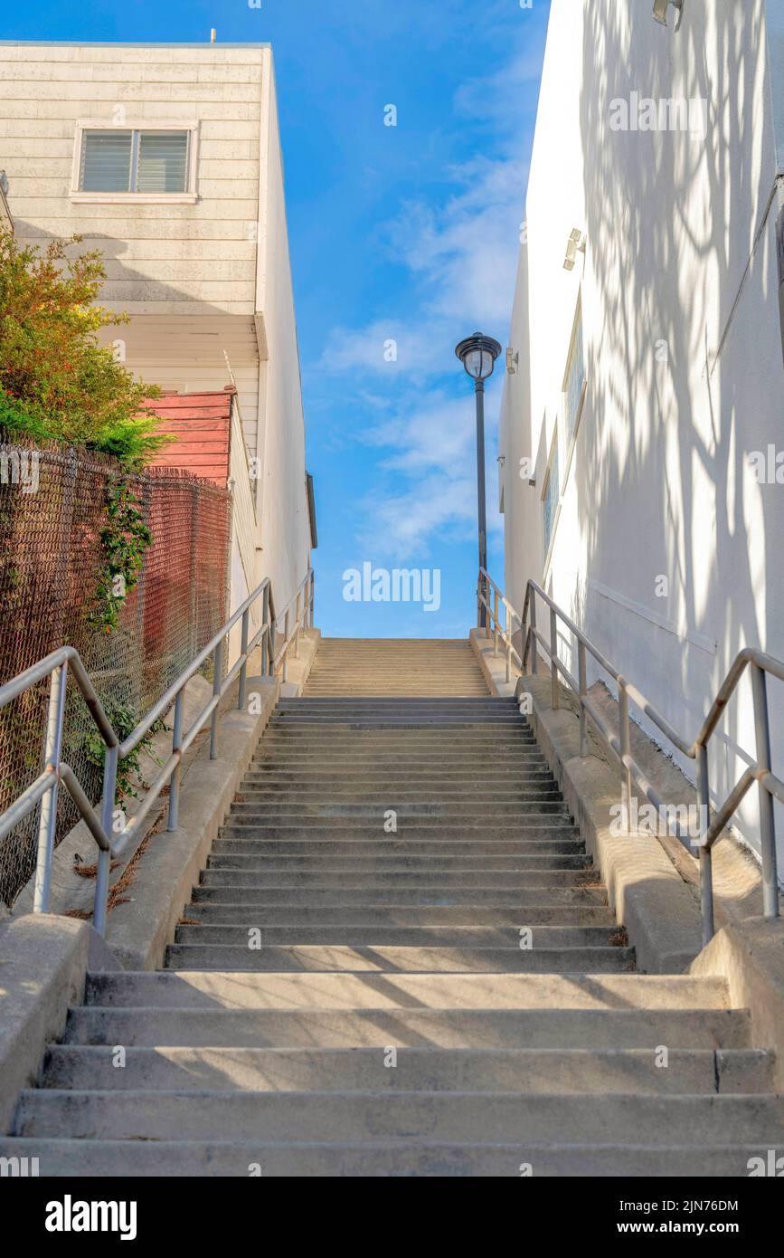Outdoor concrete staircase with lamp post at the top in San Francisco ...
