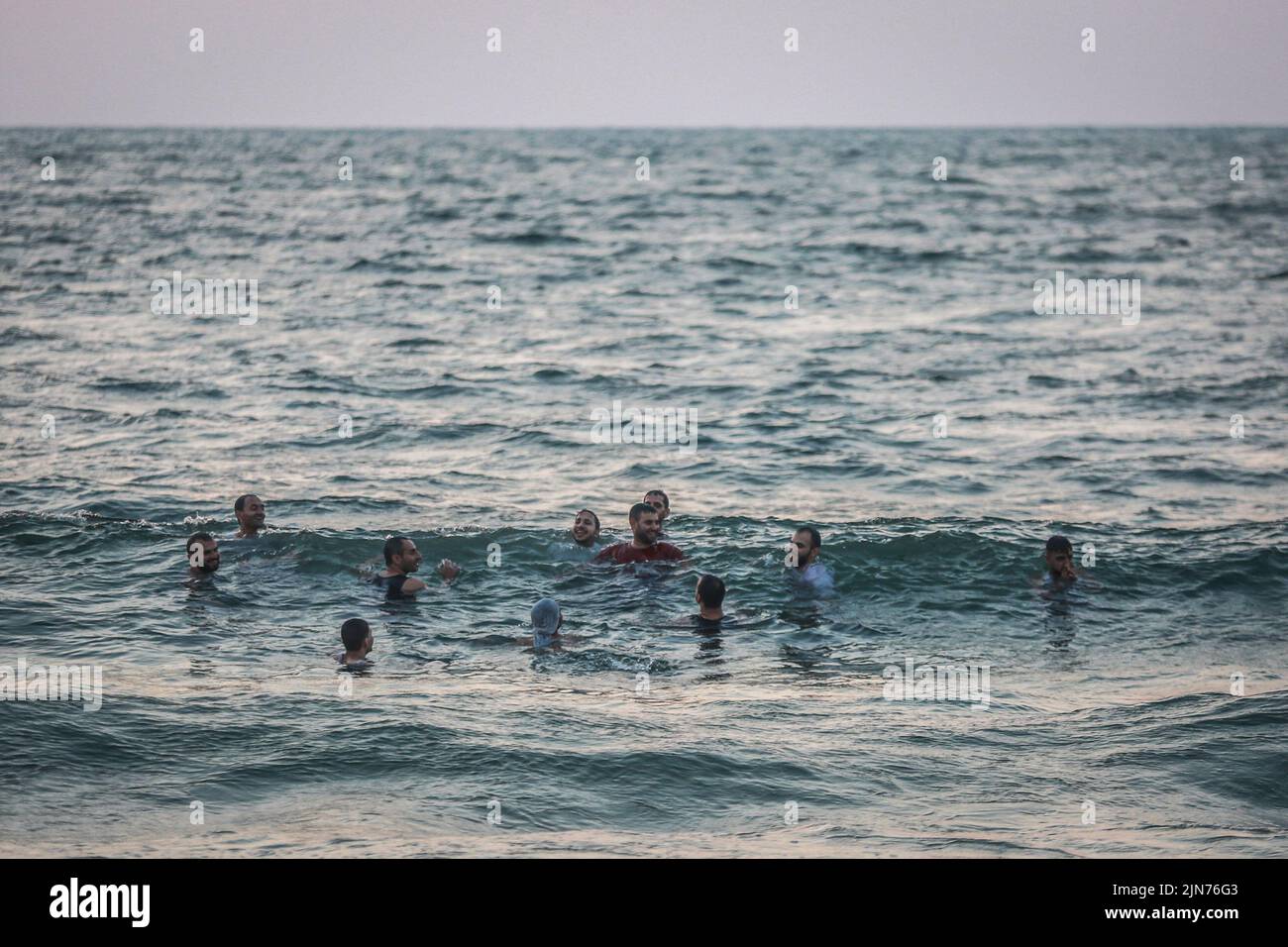 Gaza City, Palestinian Territories. 09th Aug, 2022. Palestinians swim ...