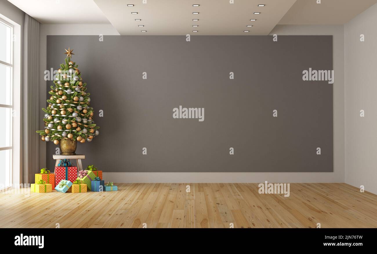 Christmas tree and gift in a empty room with brown wall and parquet ...