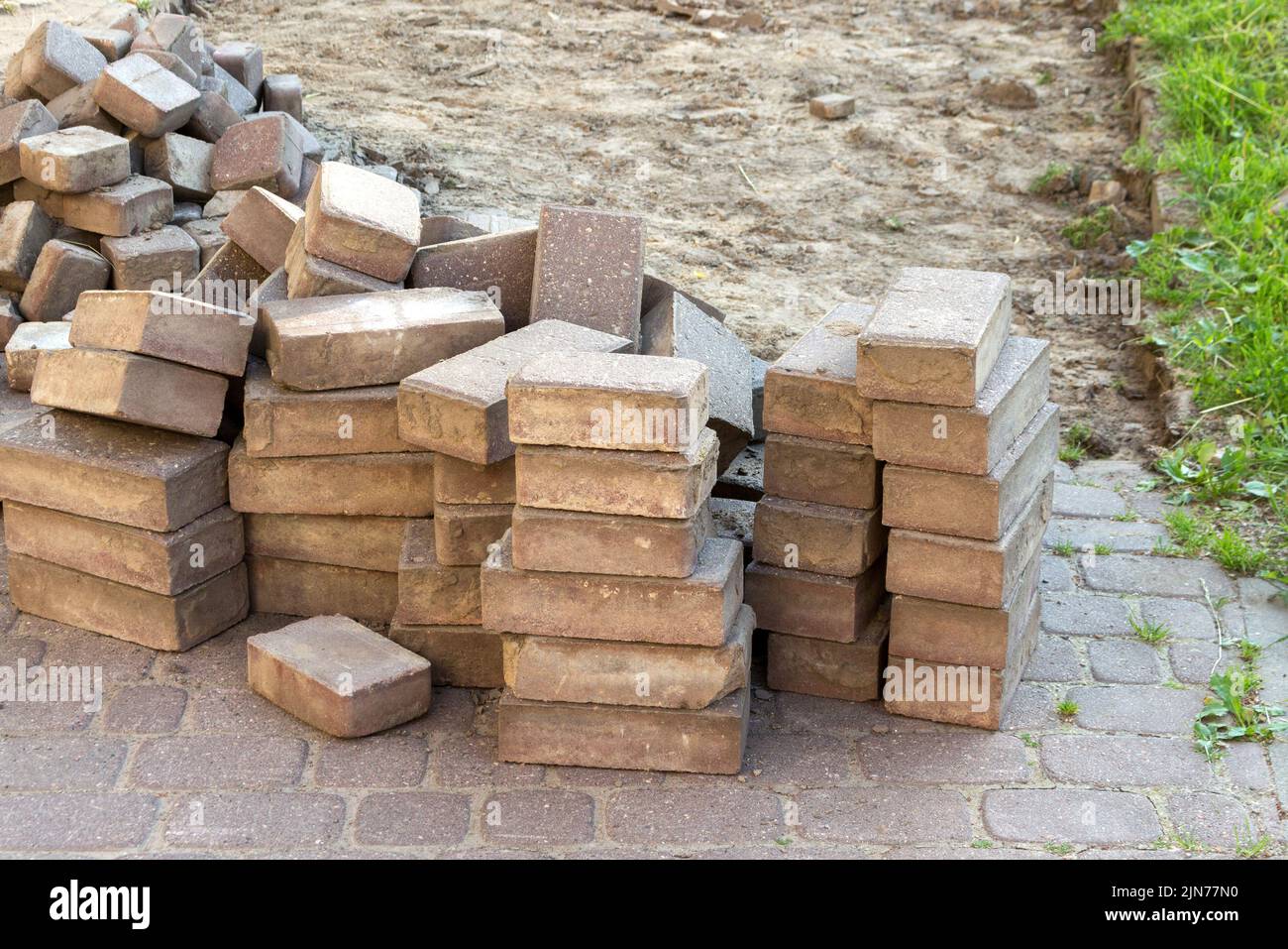 Road repair. Broken asphalt on pedestrian zone in the city street. Road ...