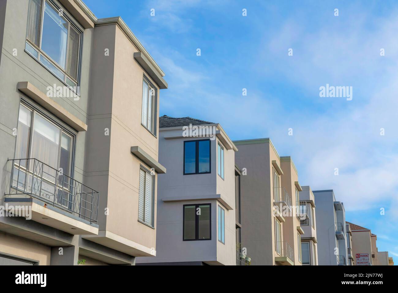 Sloped houses in San Francisco, California against the sky. Suburbs ...
