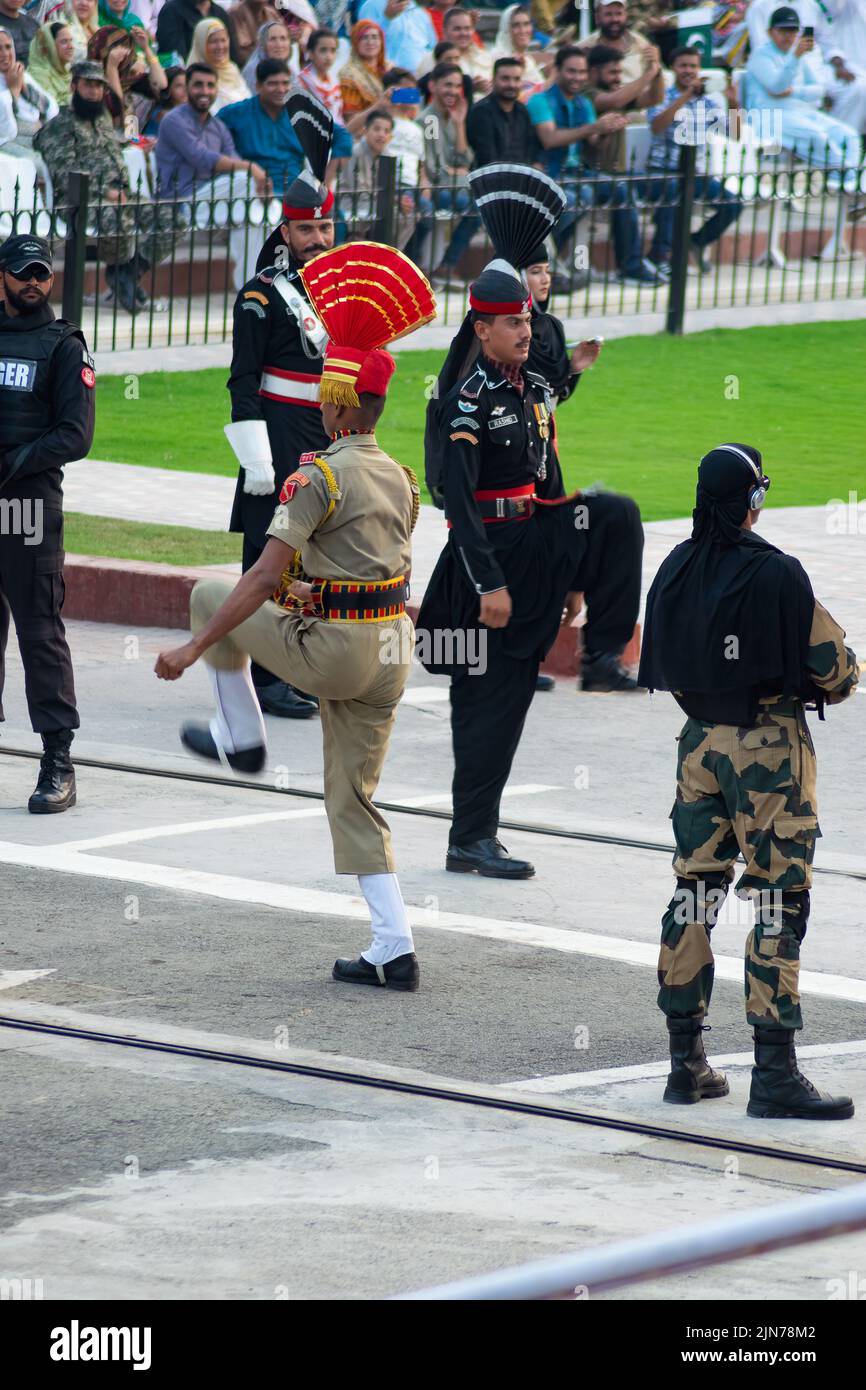 A vertical shot of marching Indian and Pakistani soldiers during the ...