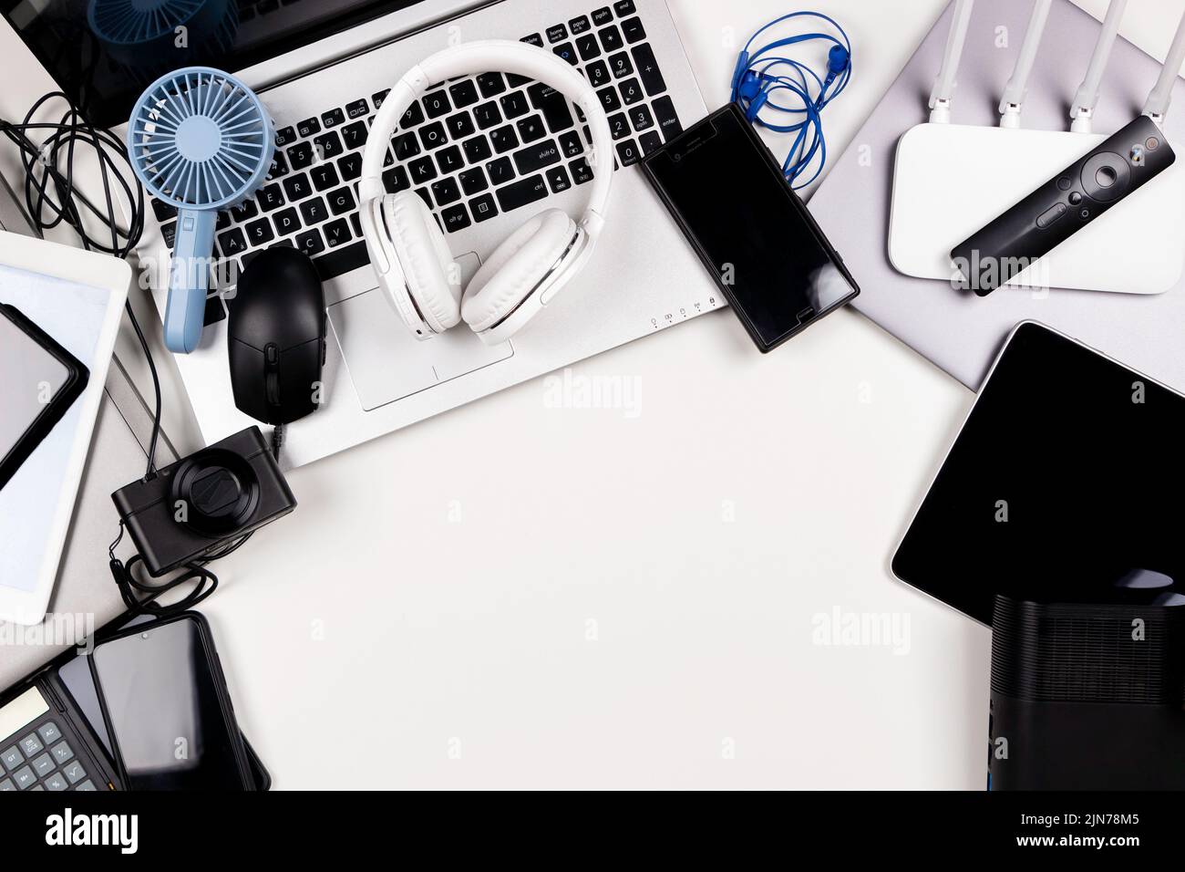 Old laptop computers, digital tablets, mobile phones, many used ...