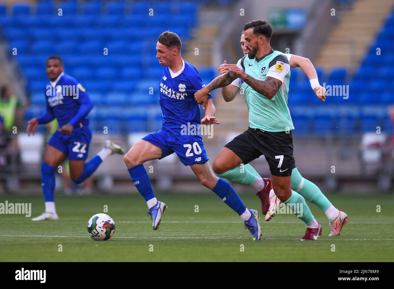 Gavin Whyte #20 of Cardiff City Under pressure from Marlon Pack #7 of ...