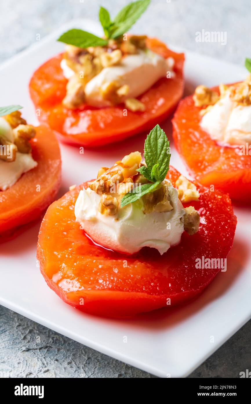 Traditional Turkish style quince dessert. The quince is cooked until ...
