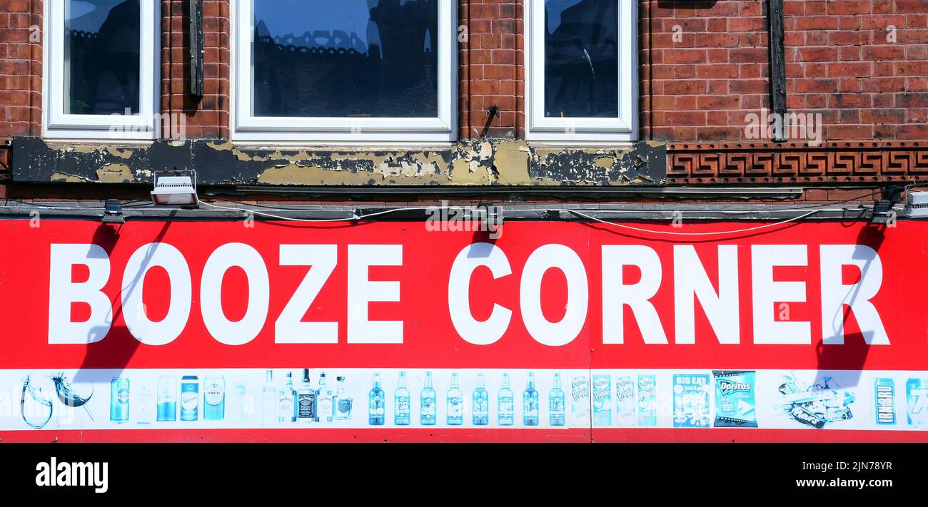 An exterior sign or signage or logo on the Booze Corner shop or store ...