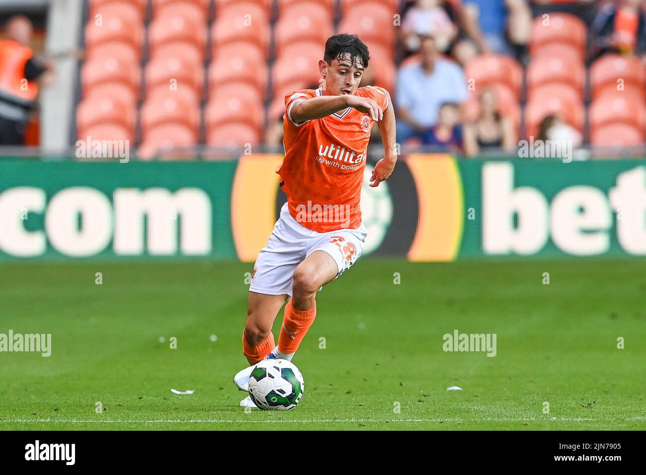 Charlie Patino #28 of Blackpool makes a break with the ball Stock Photo ...