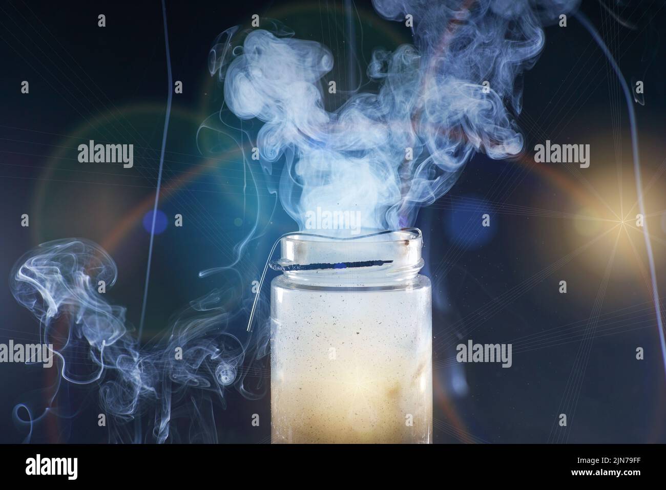 Smoke photographed in the studio with copy space and effect background ...
